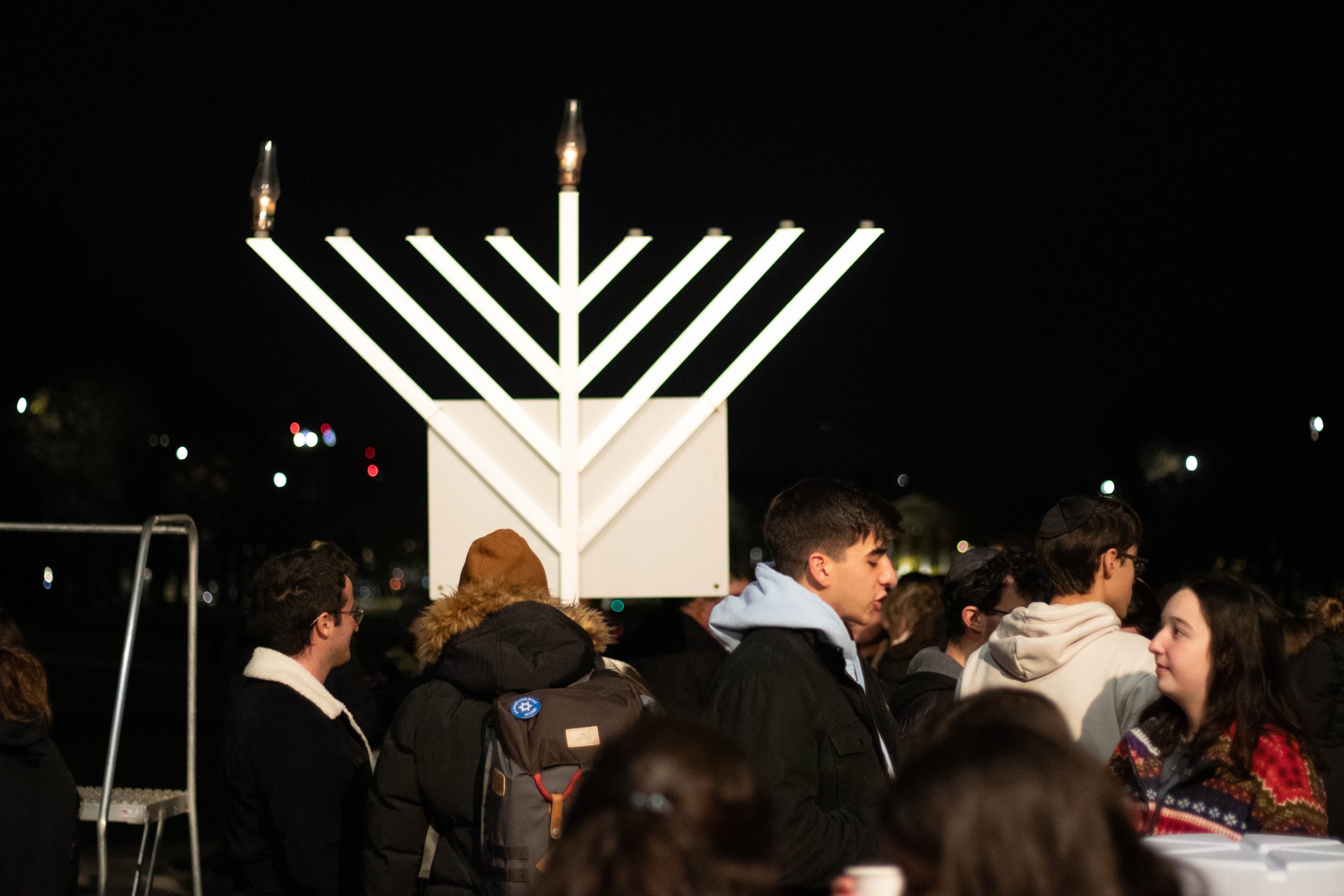 UMD community members gather for 10-foot menorah lighting to celebrate ...