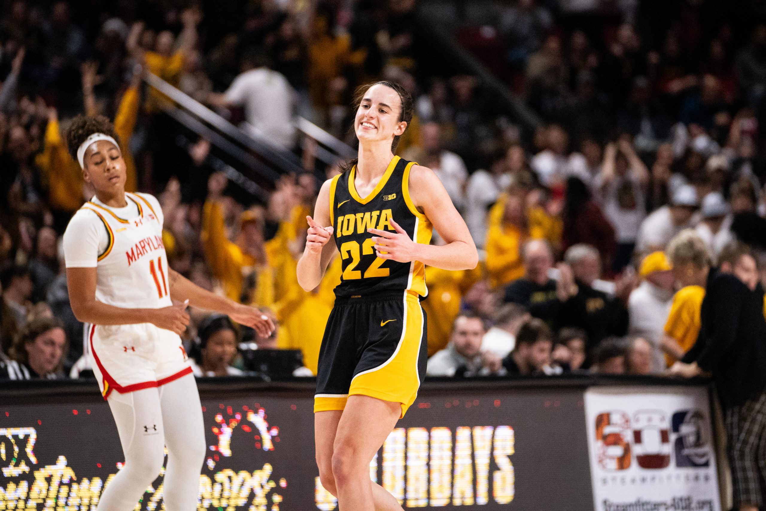 No. 3 Iowa’s Caitlin Clark draws and quiets Xfinity Center crowd as ...