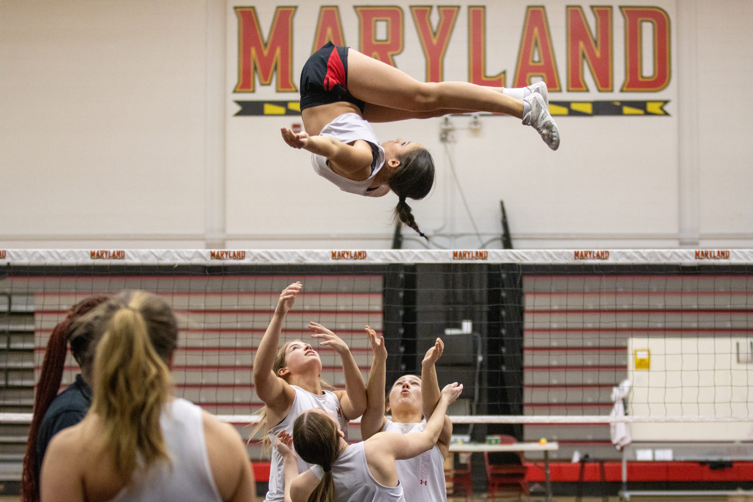 PHOTOS: Maryland Cheer flips through practices, game